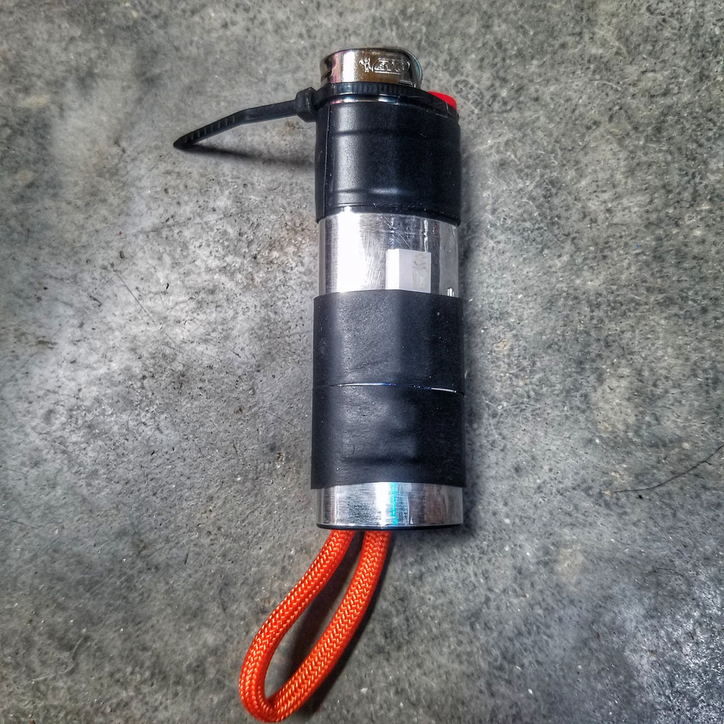 Survival Kit Lighter - Fire Starter outfitted with supplies ...