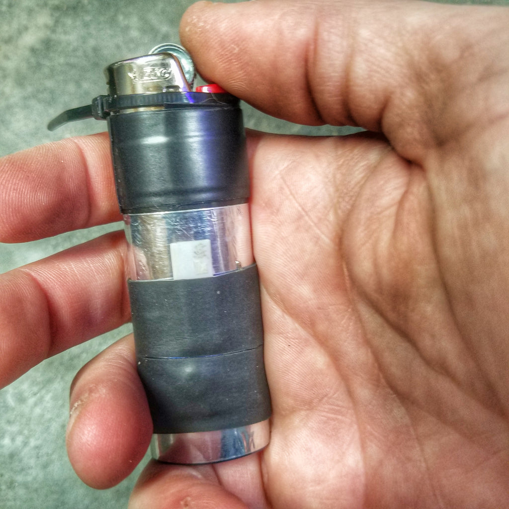 Survival Kit Lighter - Fire Starter outfitted with supplies ...